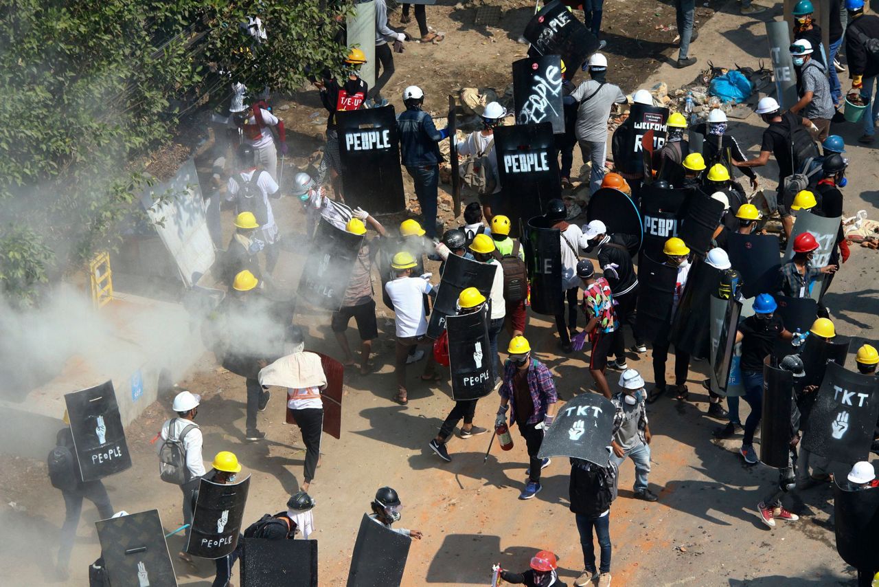 Protests, tear gas in Myanmar after UN envoy urges action