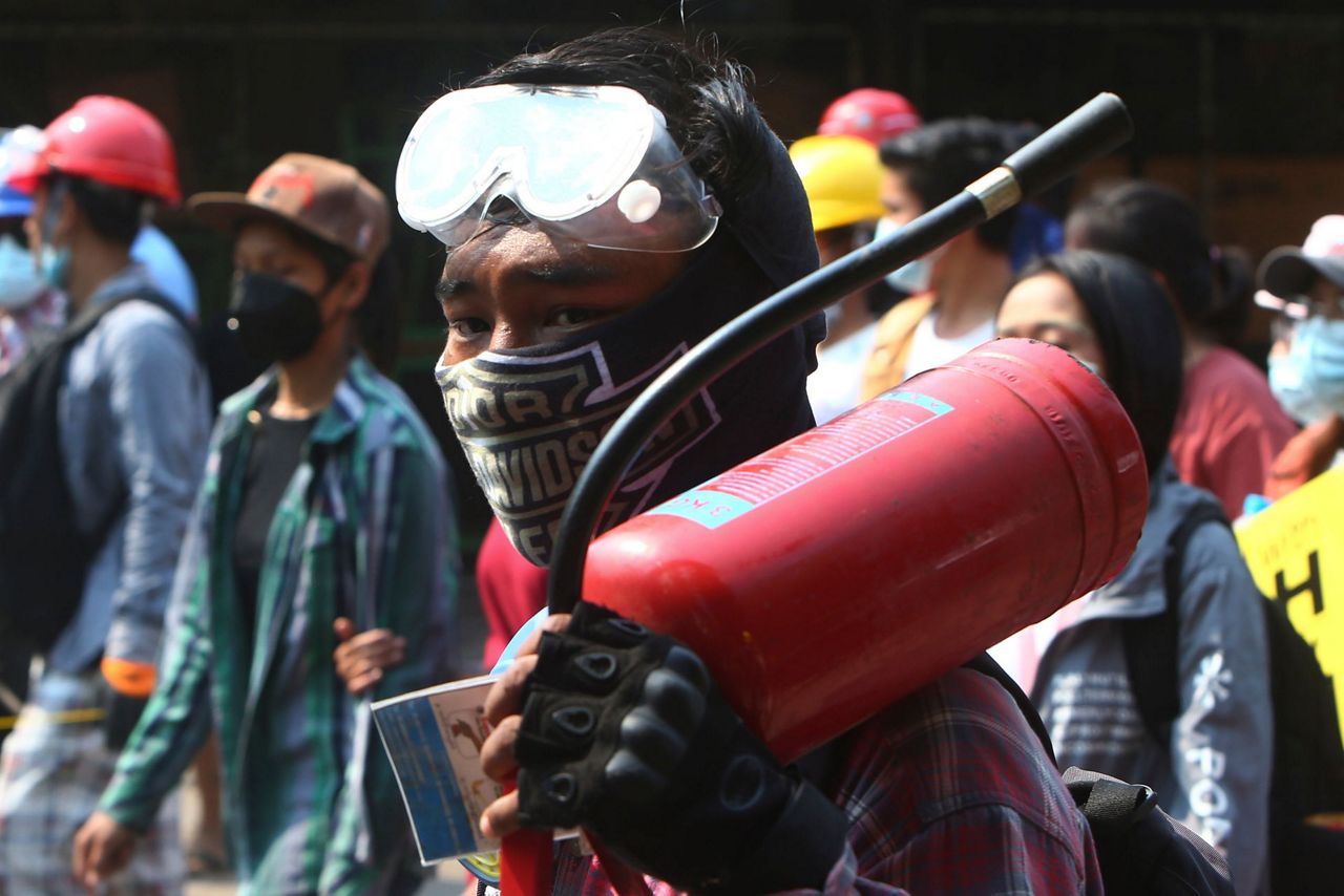Protests, tear gas in Myanmar after UN envoy urges action