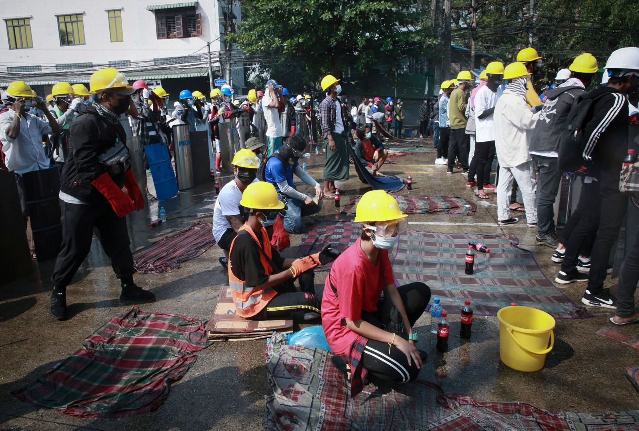Protests, tear gas in Myanmar after UN envoy urges action