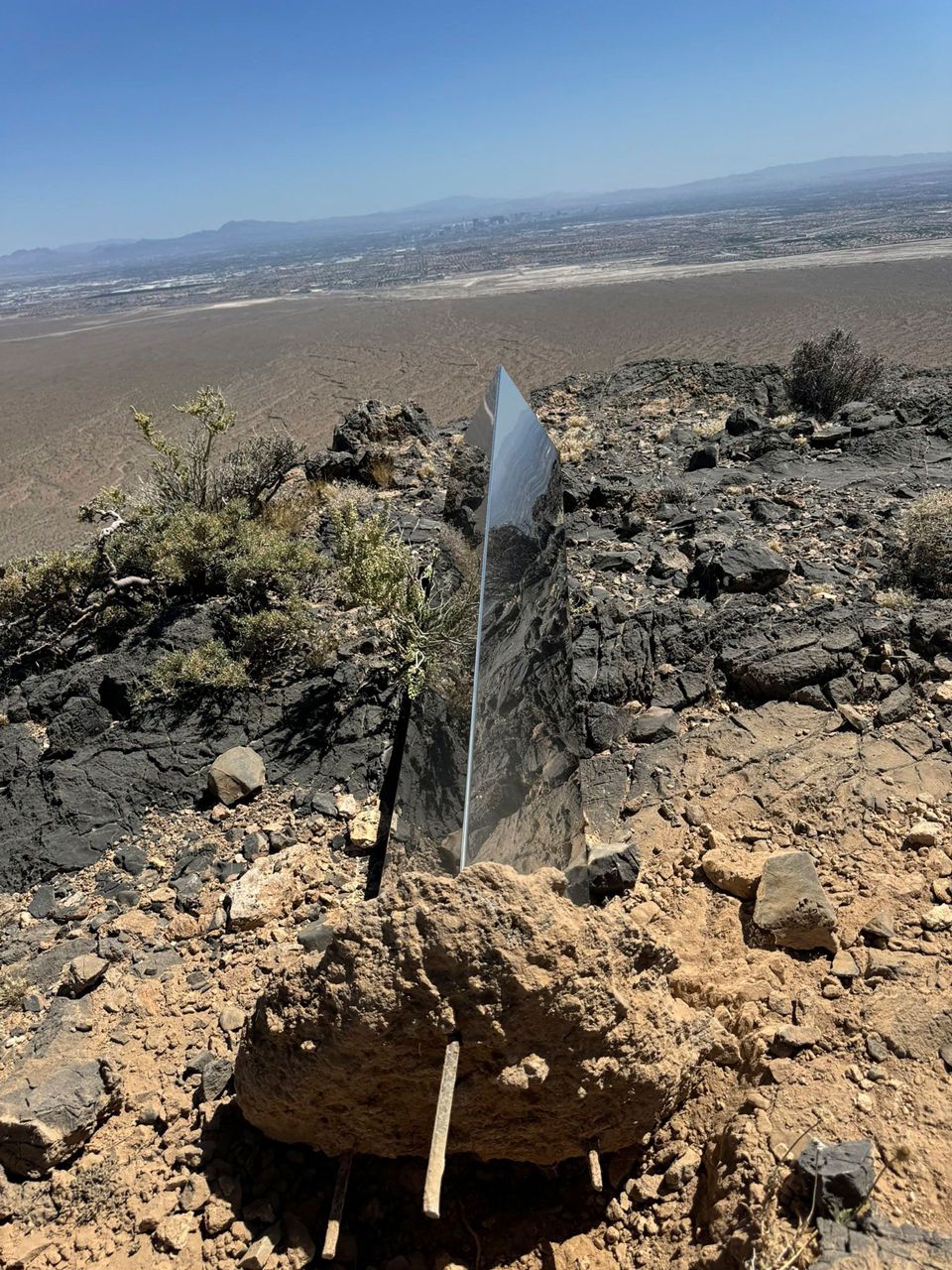 Shiny monolith removed from mountains outside Las Vegas. How it got ...