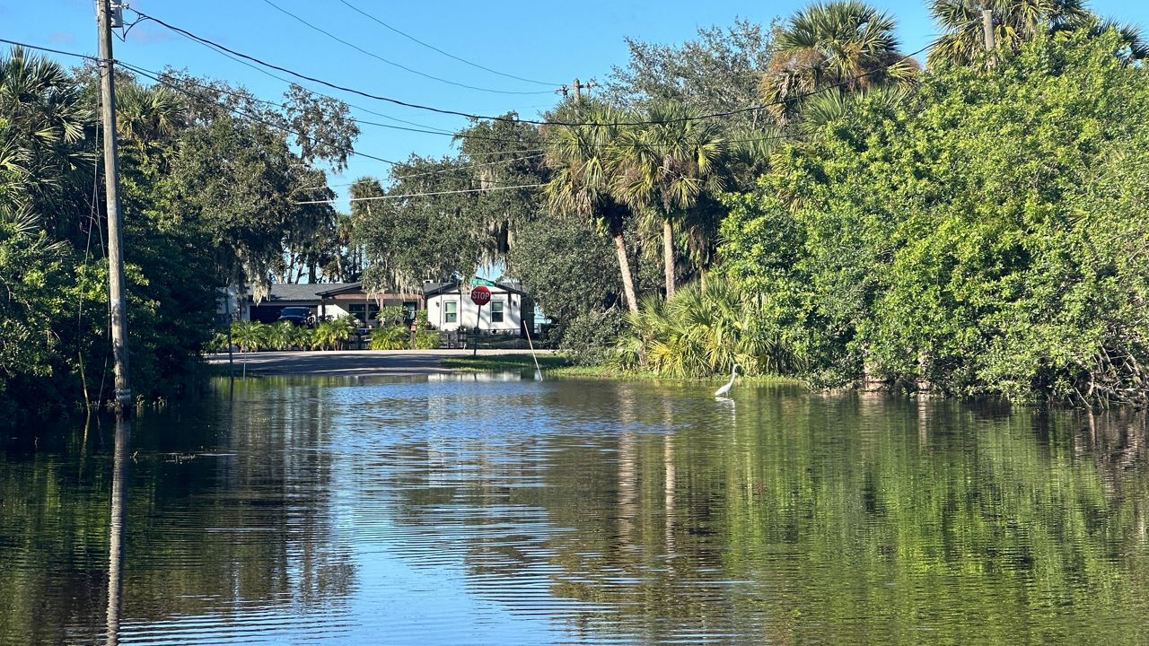Rising water levels at Lake Harney crest Friday morning