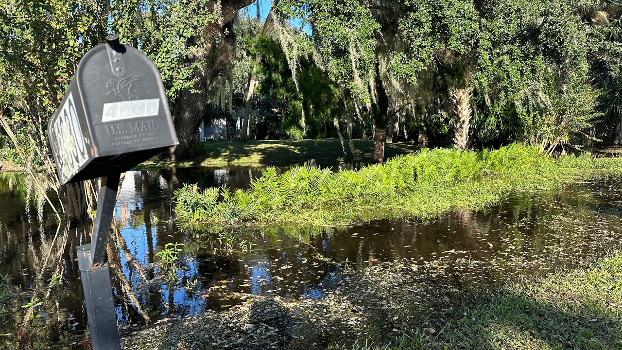 Rising water levels at Lake Harney crest Friday morning