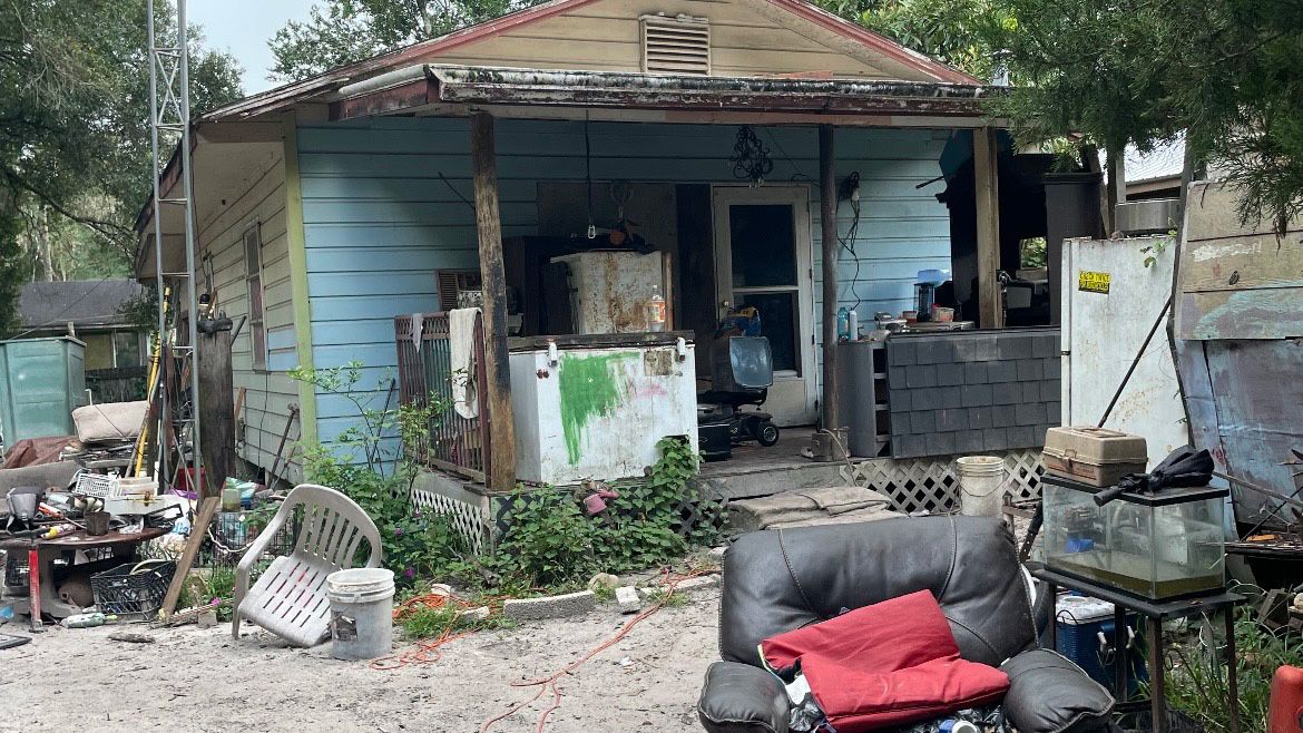 Yearslong fight against squatters' house ends in demolition