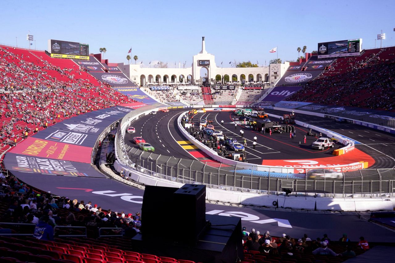 Truex wins NASCAR's sloppy return to Los Angeles Coliseum