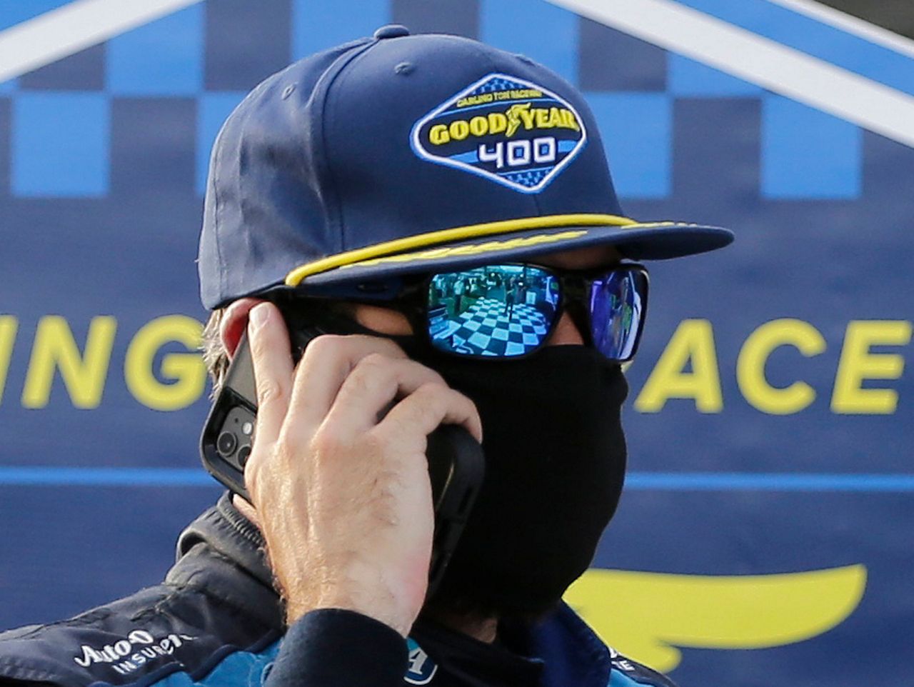 The Latest: NASCAR lifting mask mandate in garage, pits