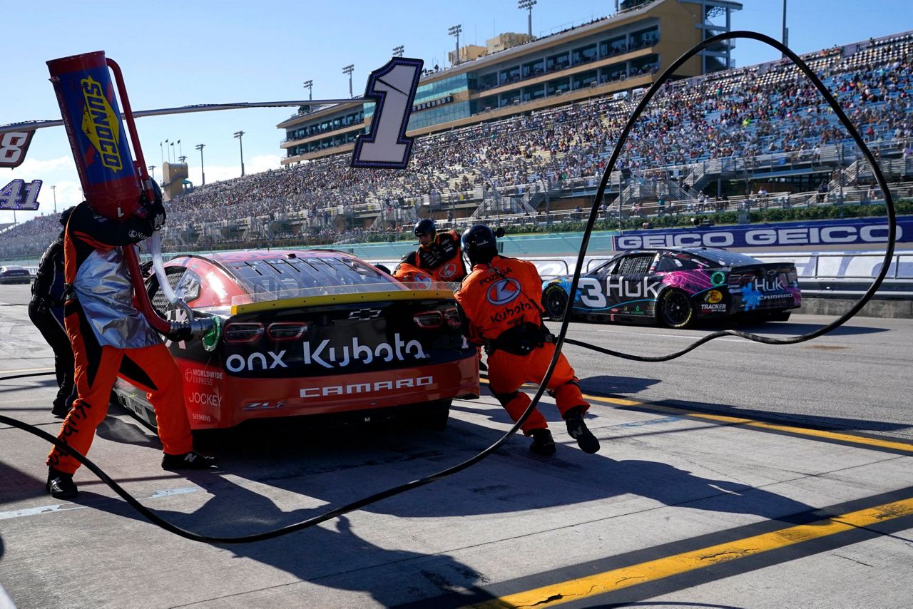 Larson wins NASCAR at Homestead, holding off Chastain at end