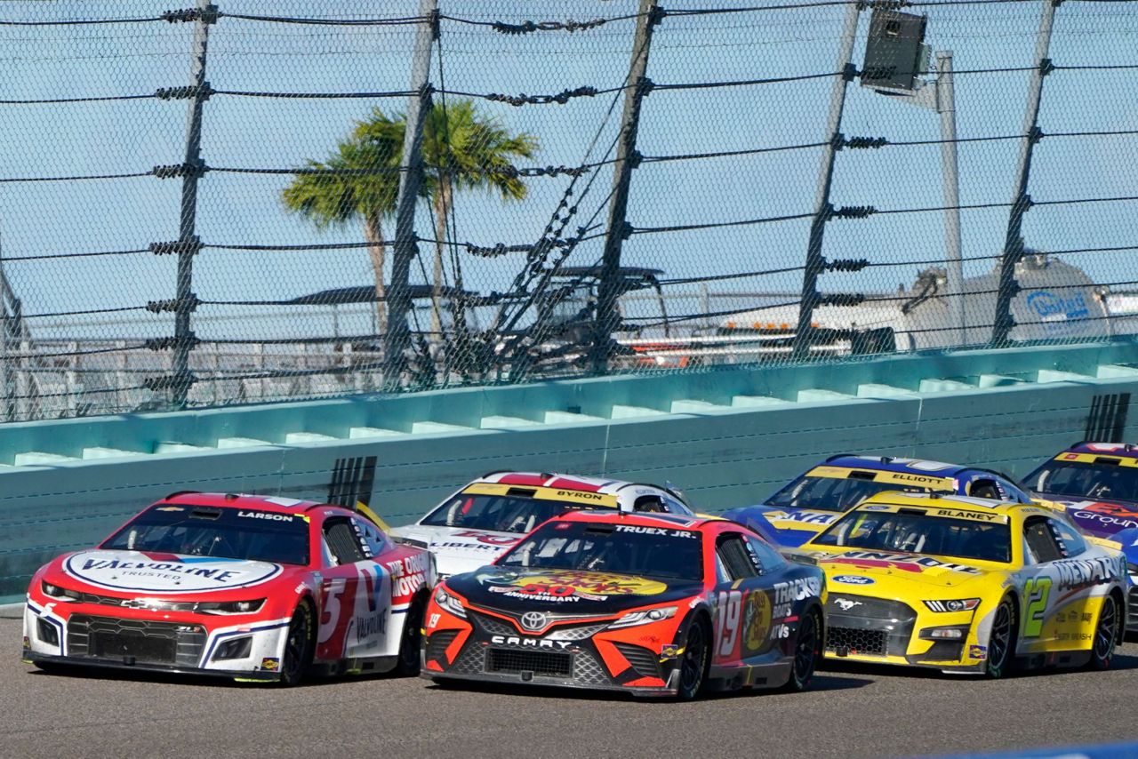 Larson wins NASCAR at Homestead, holding off Chastain at end