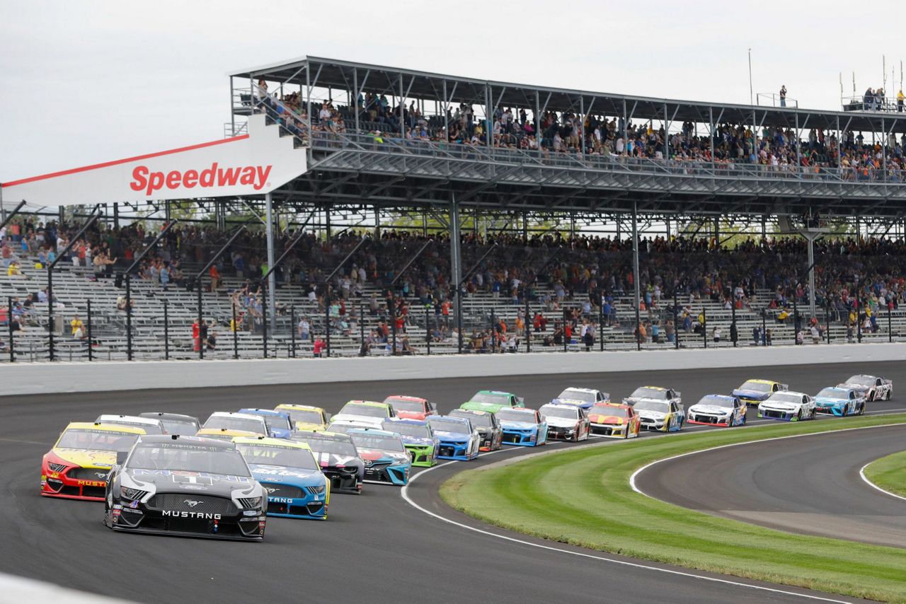 Johnson's playoff run ends as Harvick captures 2nd Brickyard
