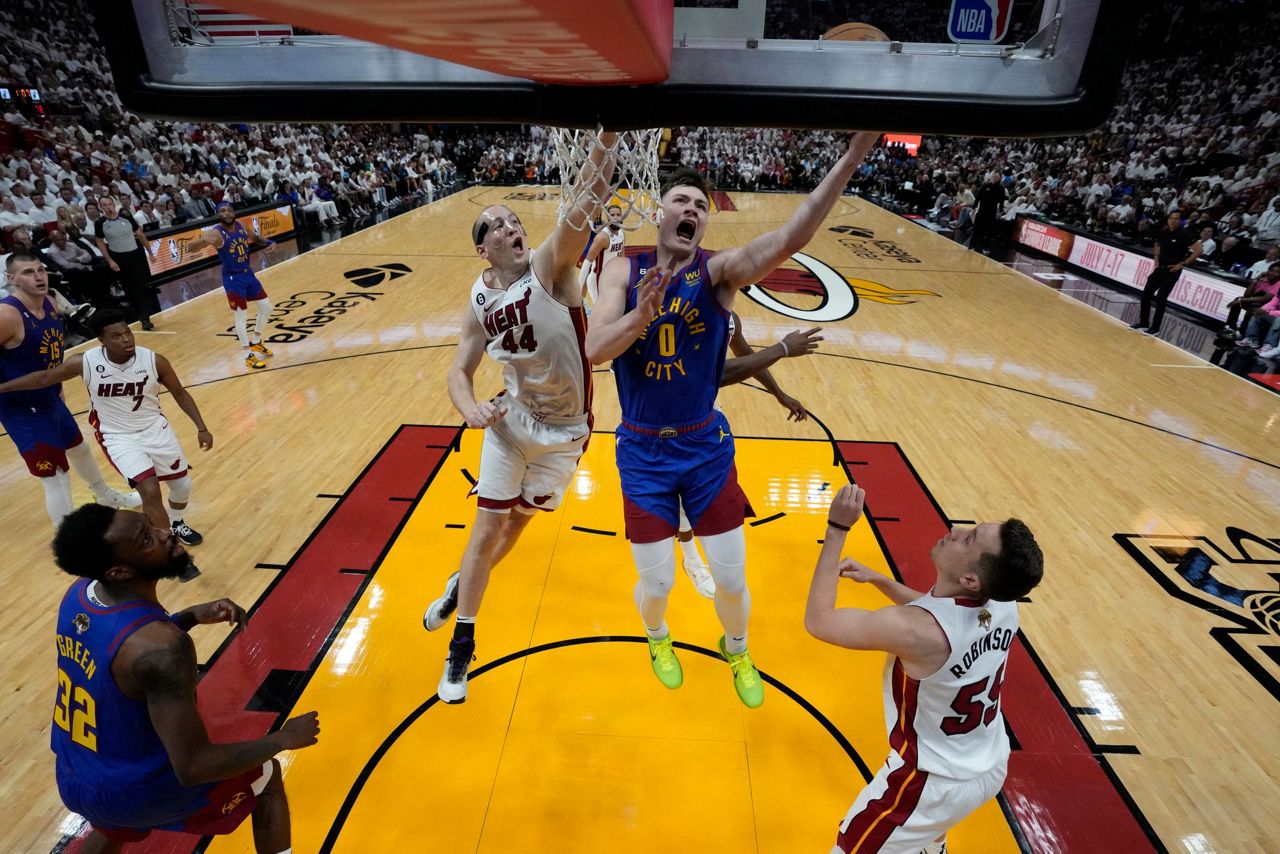 Nuggets' Christian Braun seeking NBA title a year after winning NCAA ...