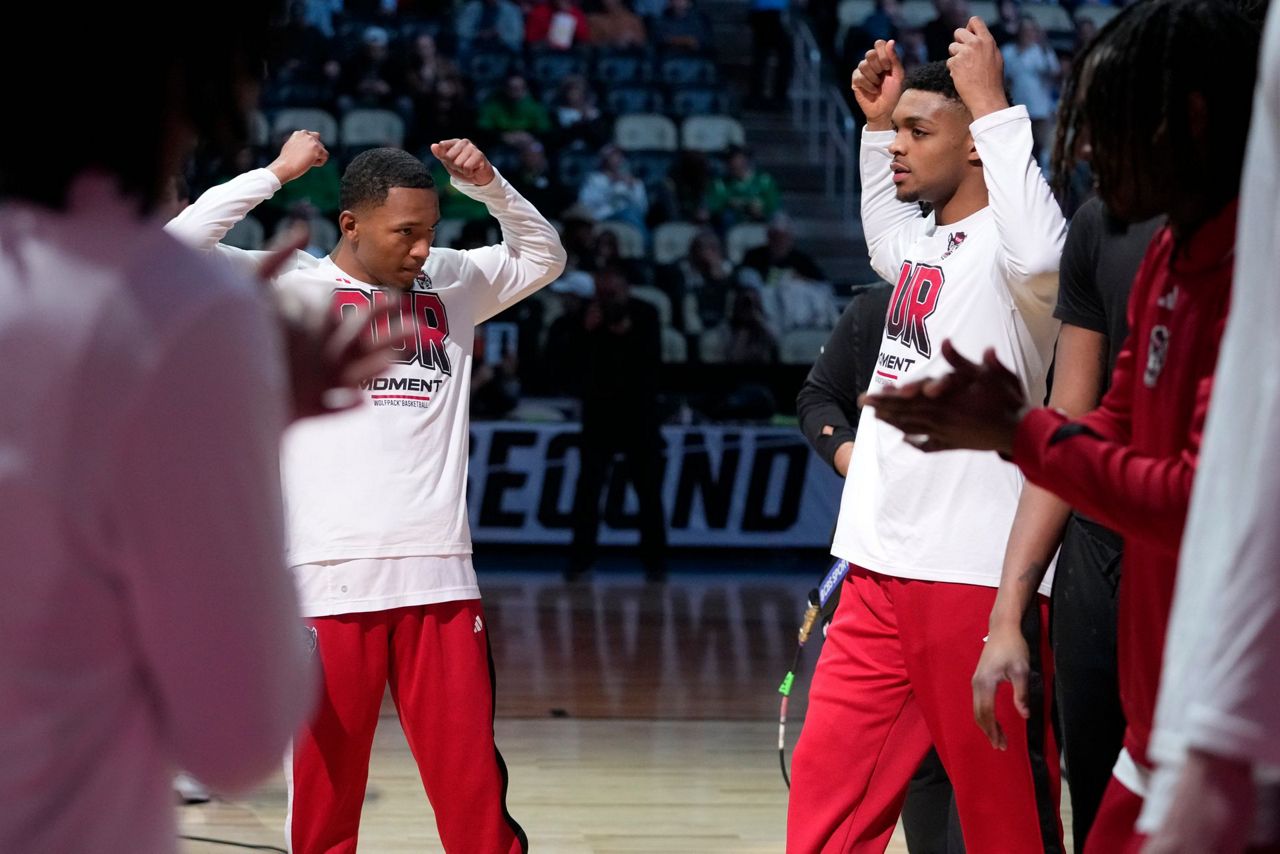 Crowns, chest bumps and swagger: In March Madness, the handshake isn't ...