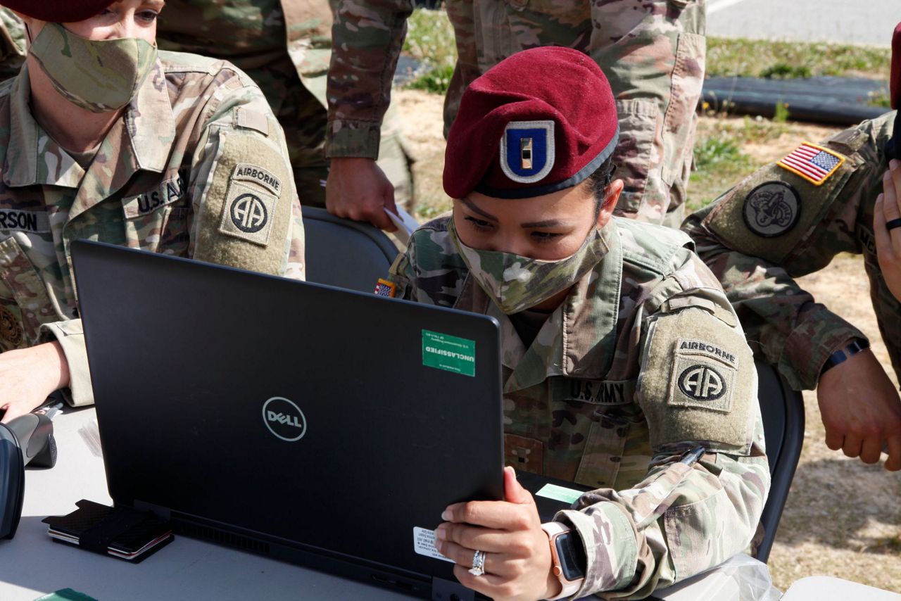 As soldiers deploy amid pandemic, they fight 2 battles