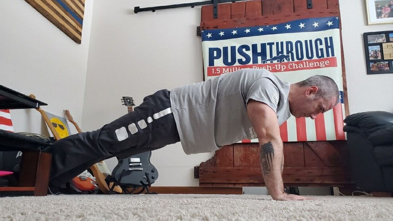 Wisconsin Father Hits Milestone in Quest to Break Push-Up World Record