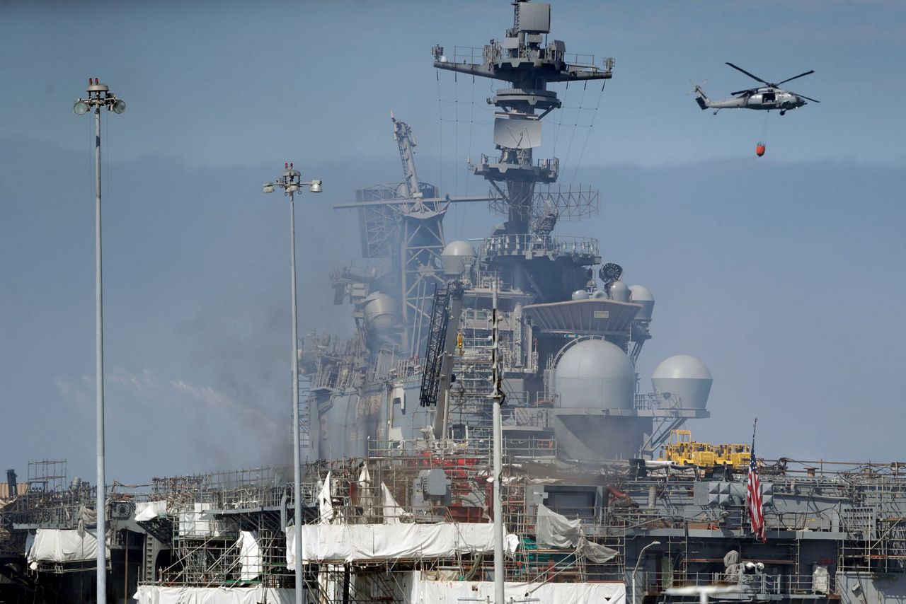 Explosion threat eases at burning Navy warship in San Diego