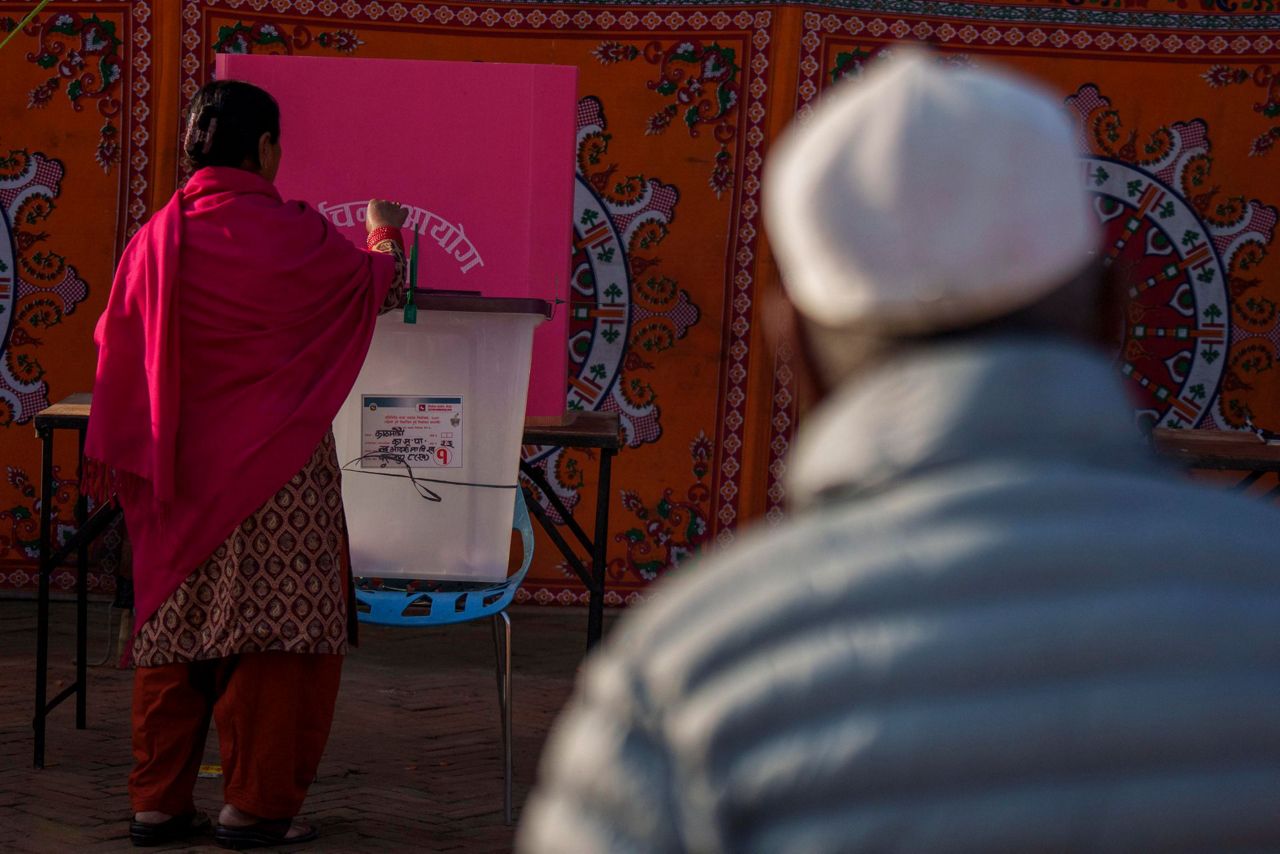 Voters in Nepal line up to elect new members of Parliament