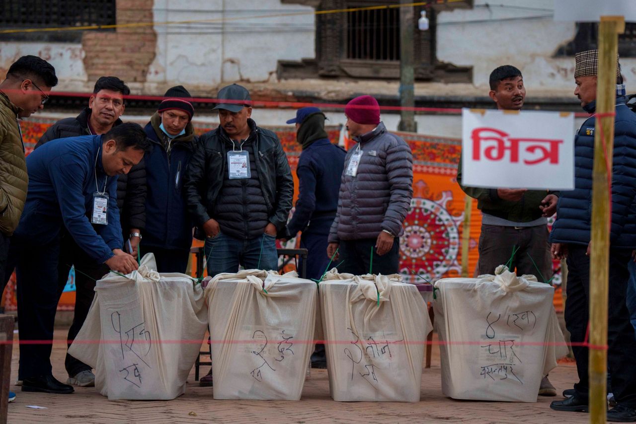 Voters in Nepal line up to elect new members of Parliament