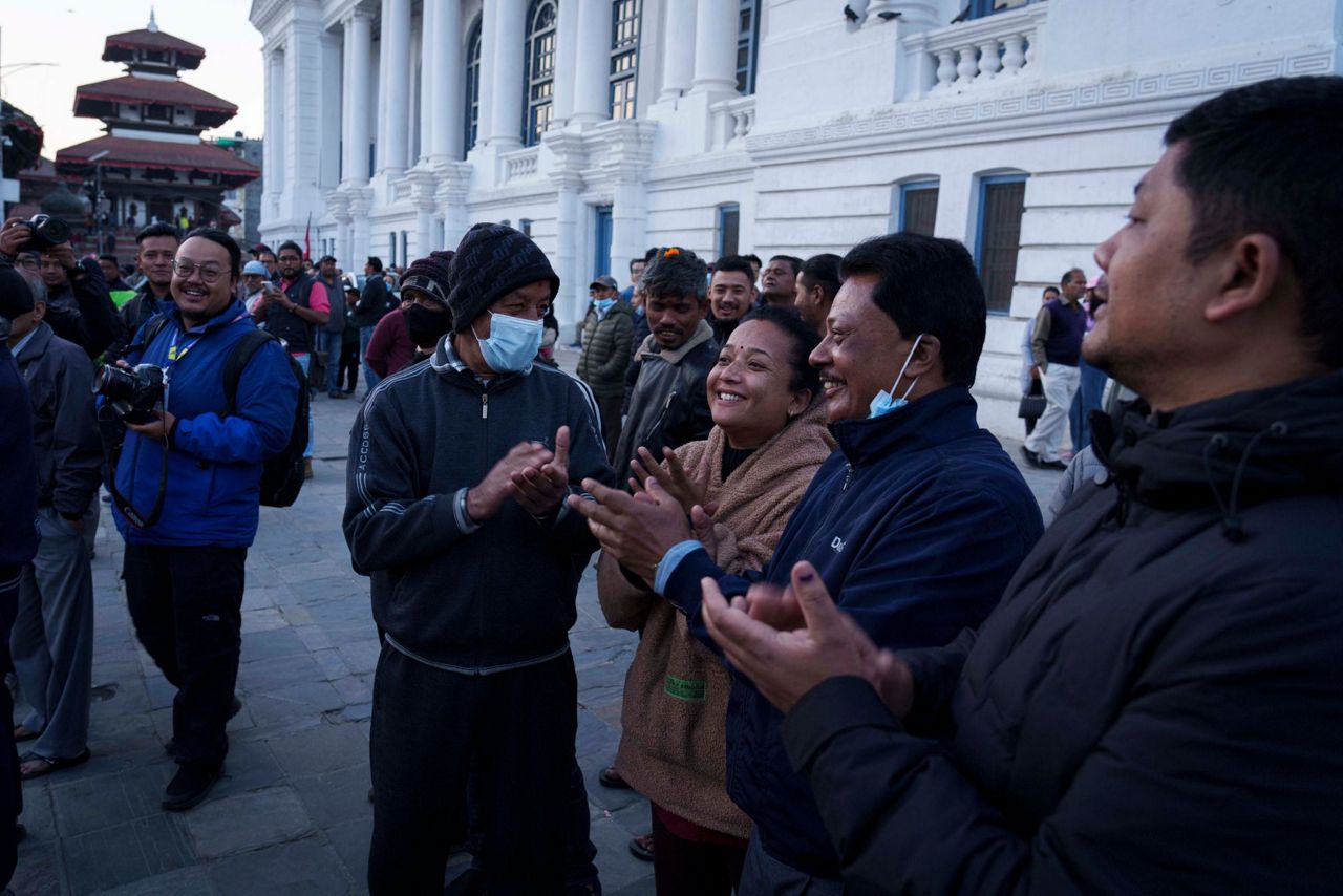Voters in Nepal line up to elect new members of Parliament