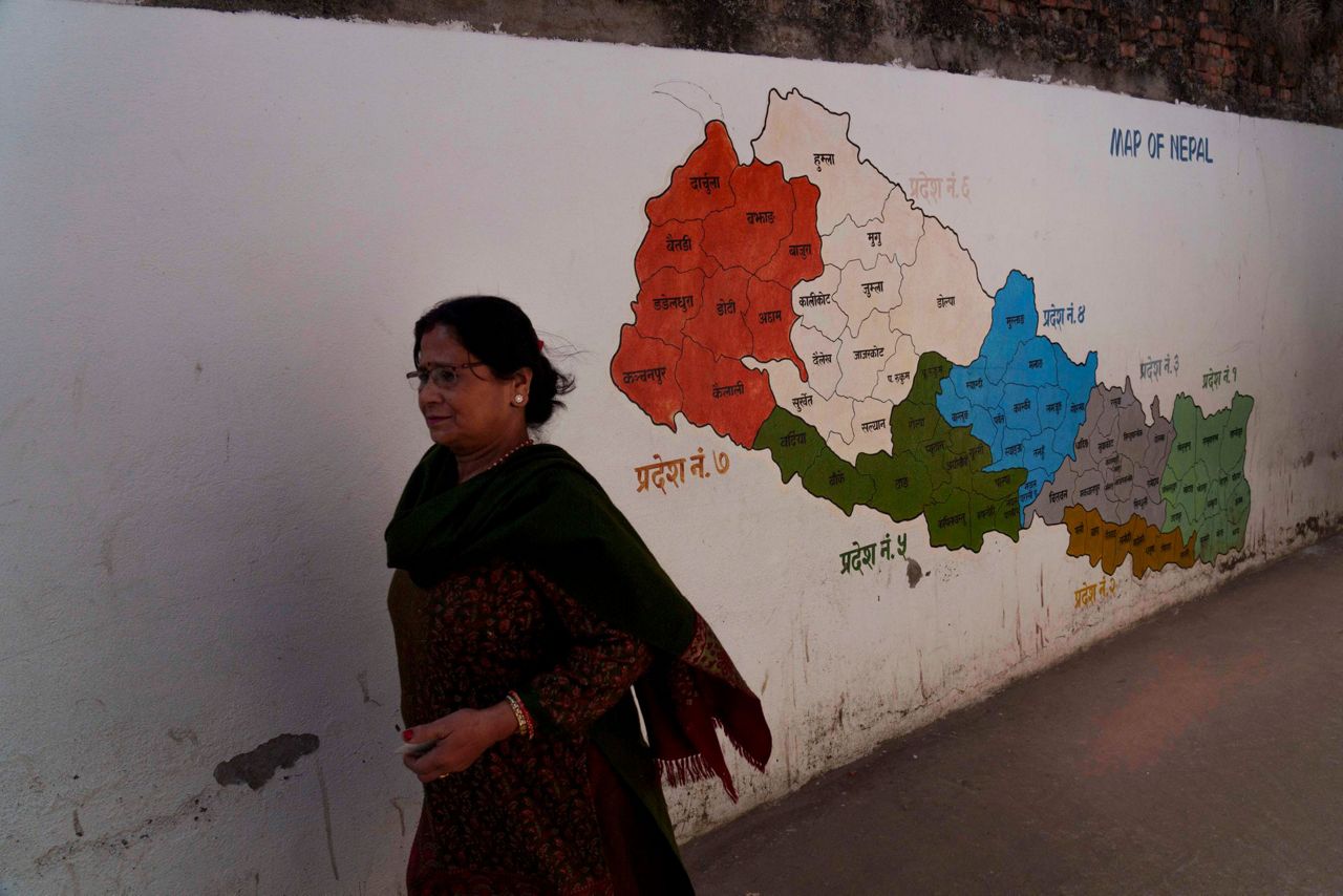 Voters in Nepal line up to elect new members of Parliament