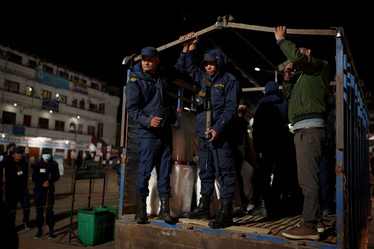 Voters in Nepal line up to elect new members of Parliament