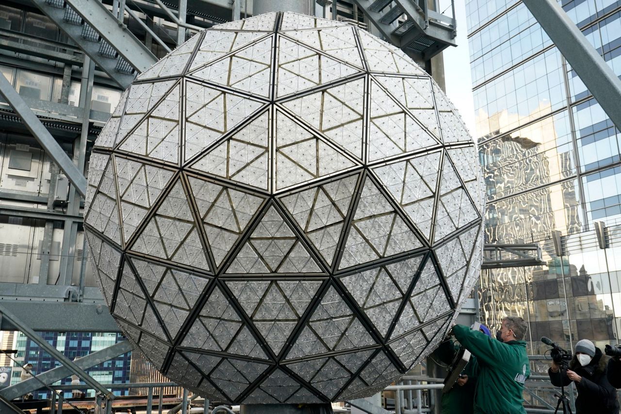 Workers install 192 crystals on Times Square New Year's ball