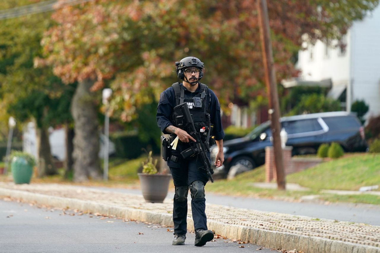 Gunman who wounded 2 Newark police officers remains at large
