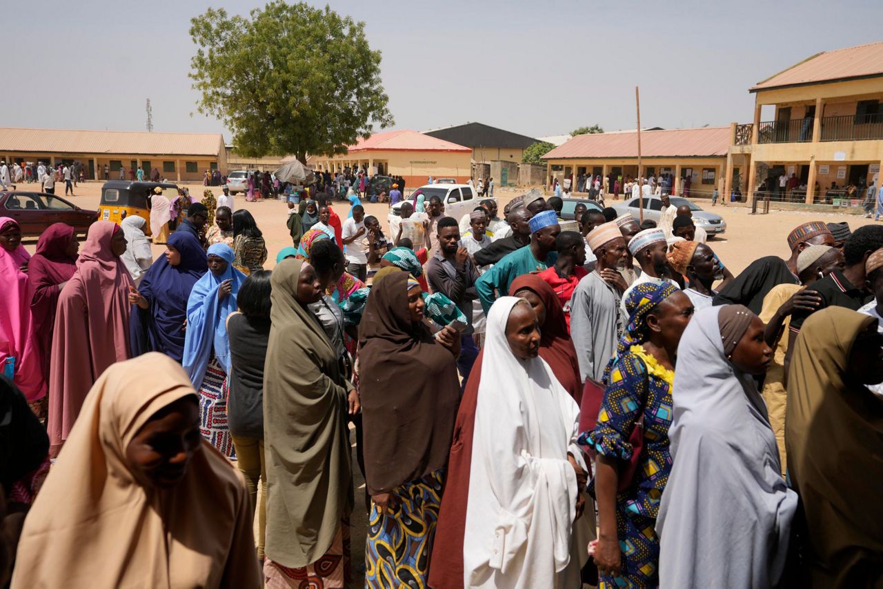 Nigeria voters still lining up after voting was due to close