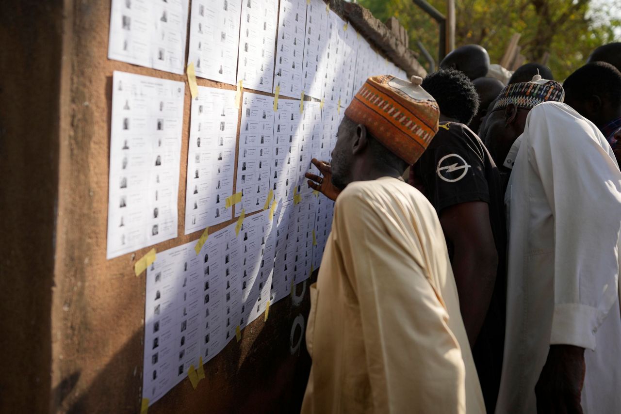 Nigeria voters still lining up after voting was due to close