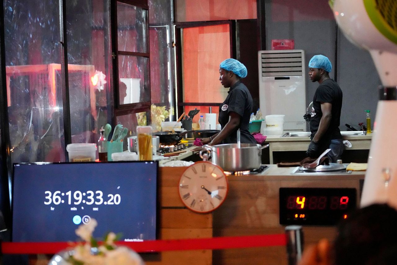 Eyeing new global record, Nigerian chef cooks for nearly 100 hours