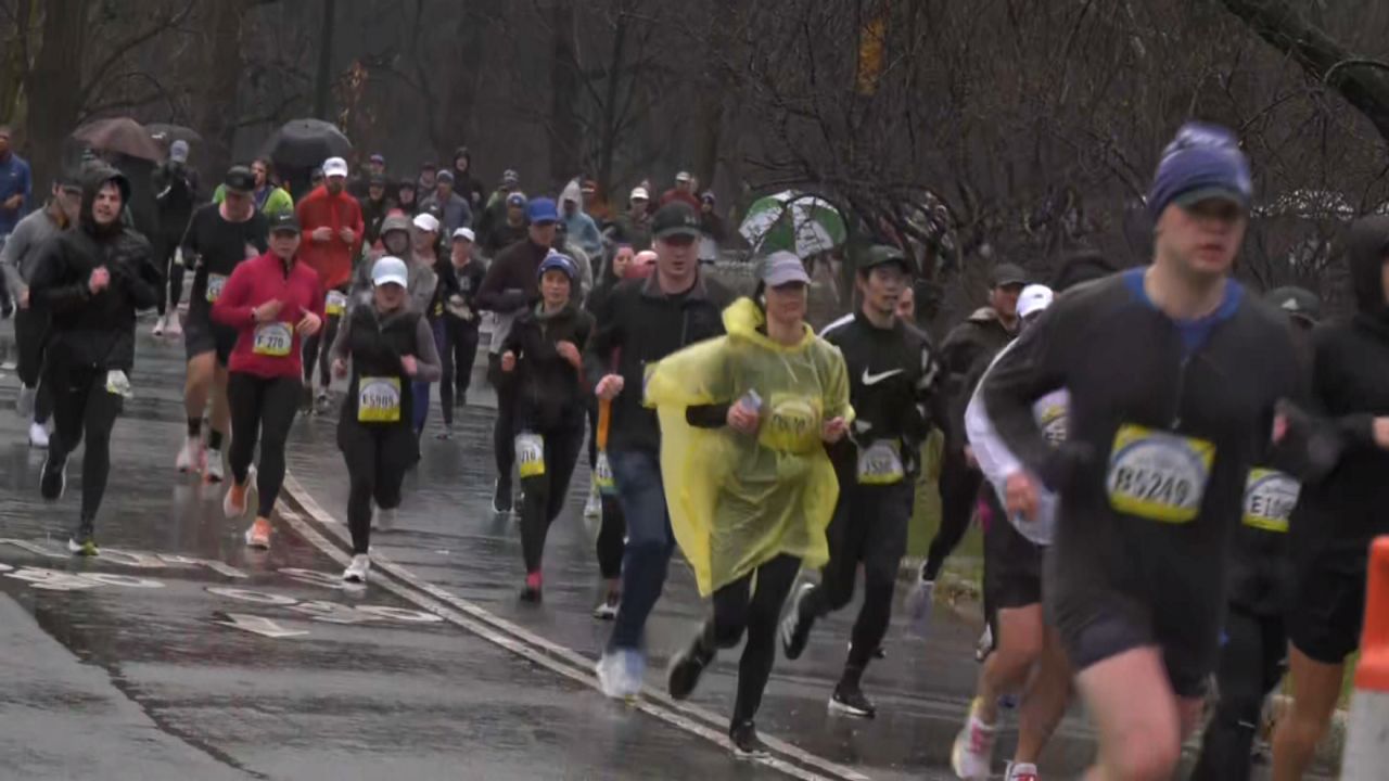 Runners brave the rain for half marathon honoring Fred Lebow