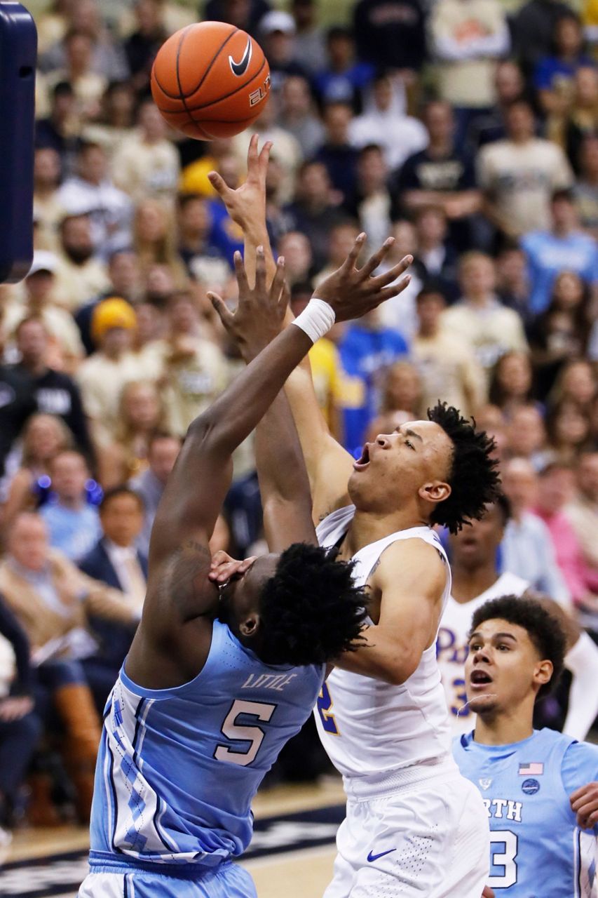 Cam Johnson scores 15 points, No. 15 UNC tops Pitt 85-60