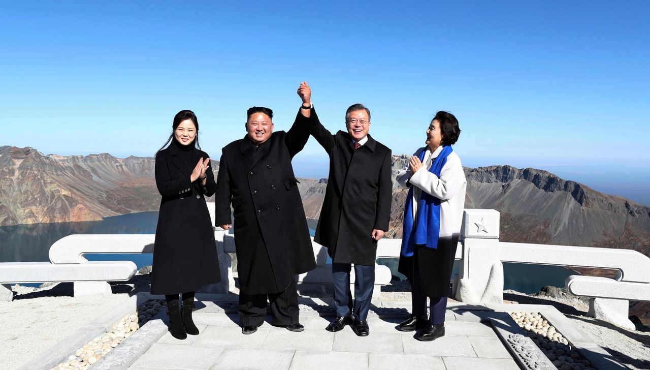 Kim, Moon head to North Korea's sacred volcano on final day