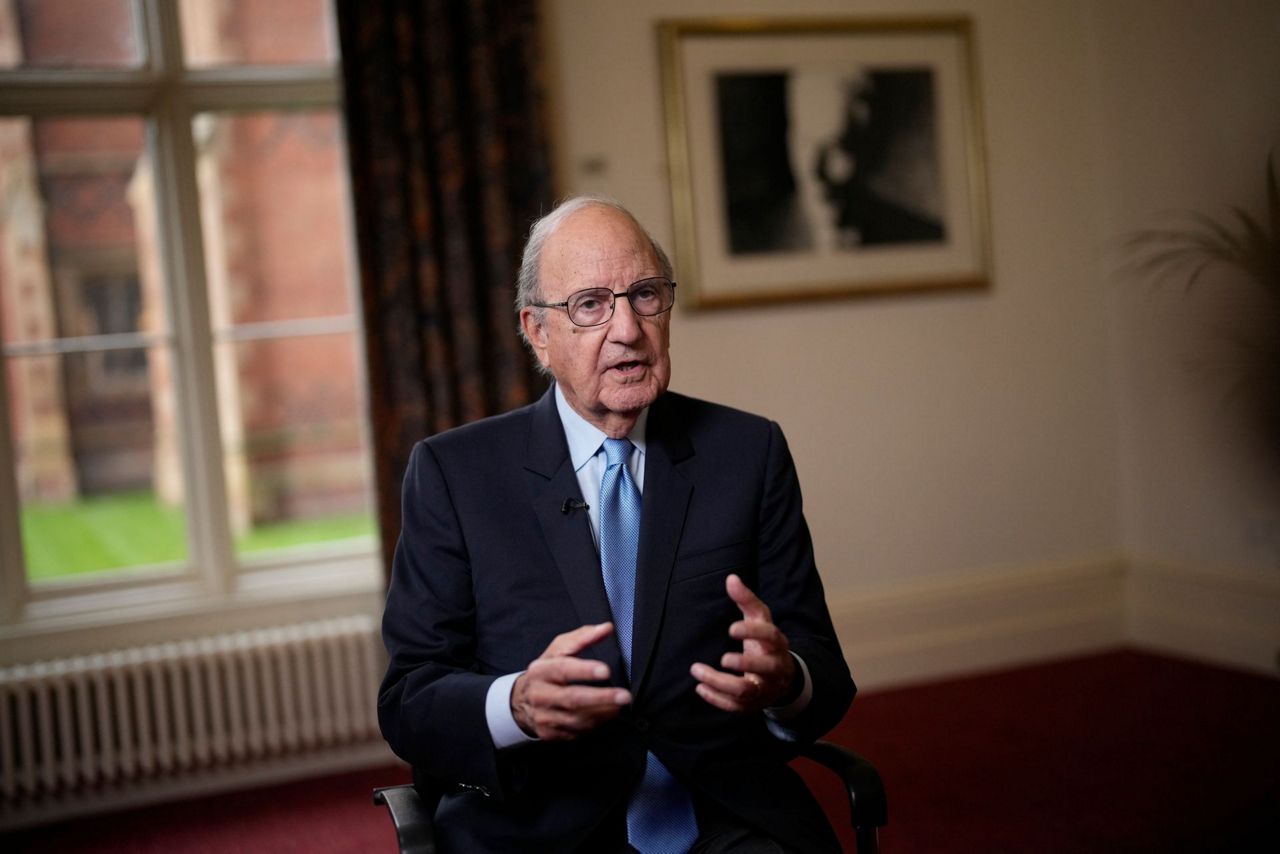 Peacemaker George Mitchell makes poignant Belfast return