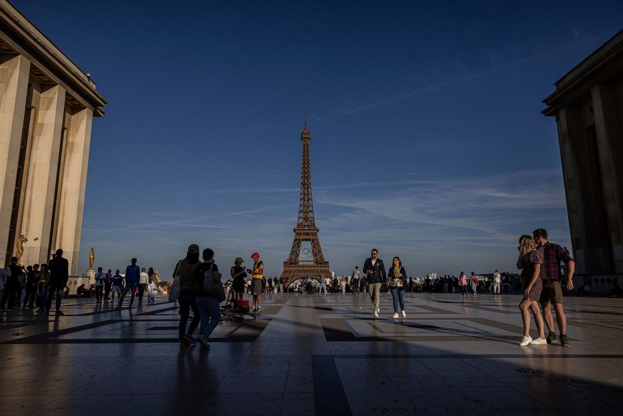 Paris Olympics organizers unveil a display of the five Olympic rings ...
