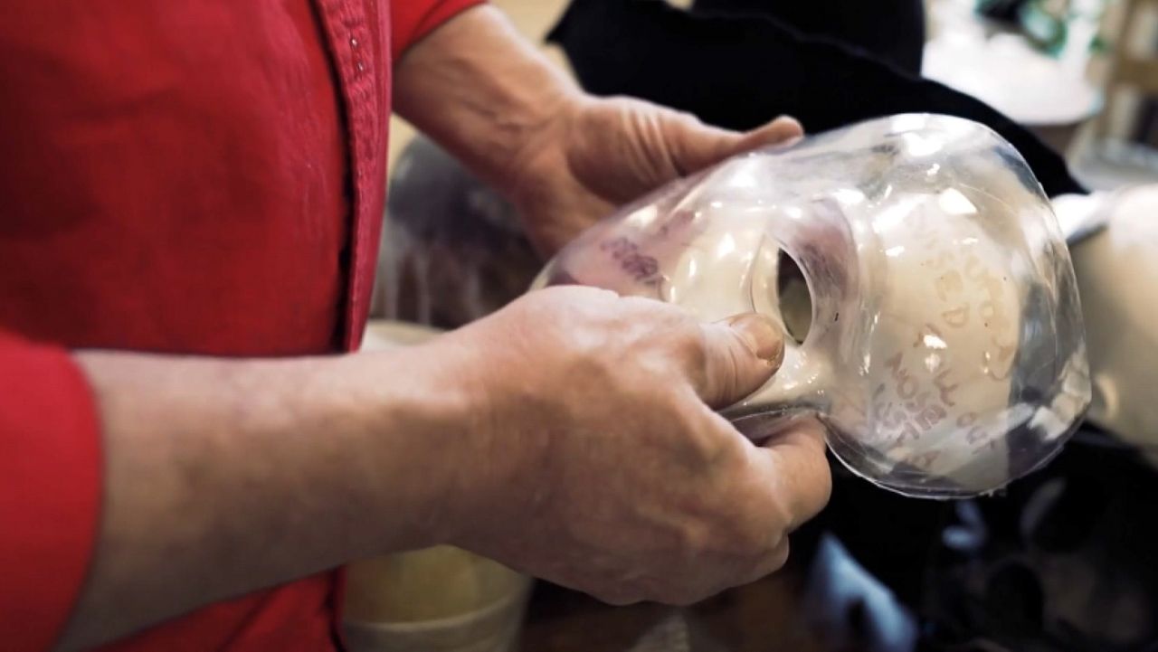 Behind the Phantom mask in ‘The Phantom of the Opera’