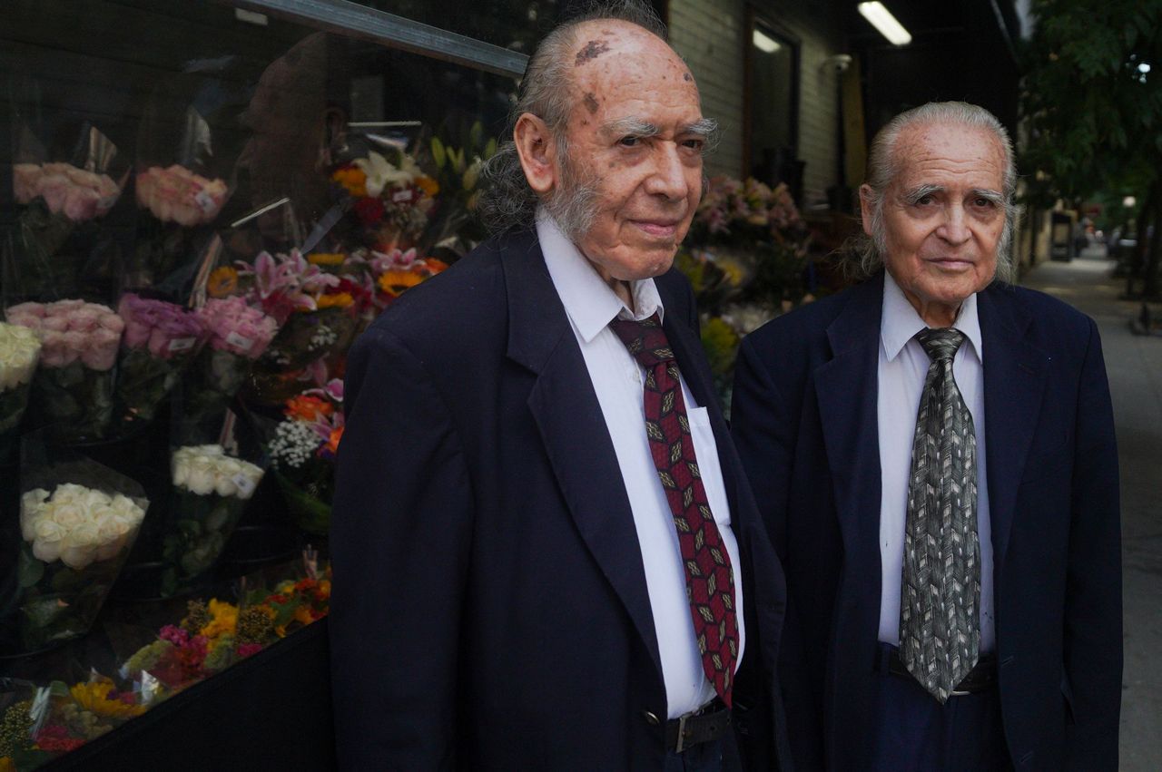 Octogenarian brothers make popular hand-drawn posters