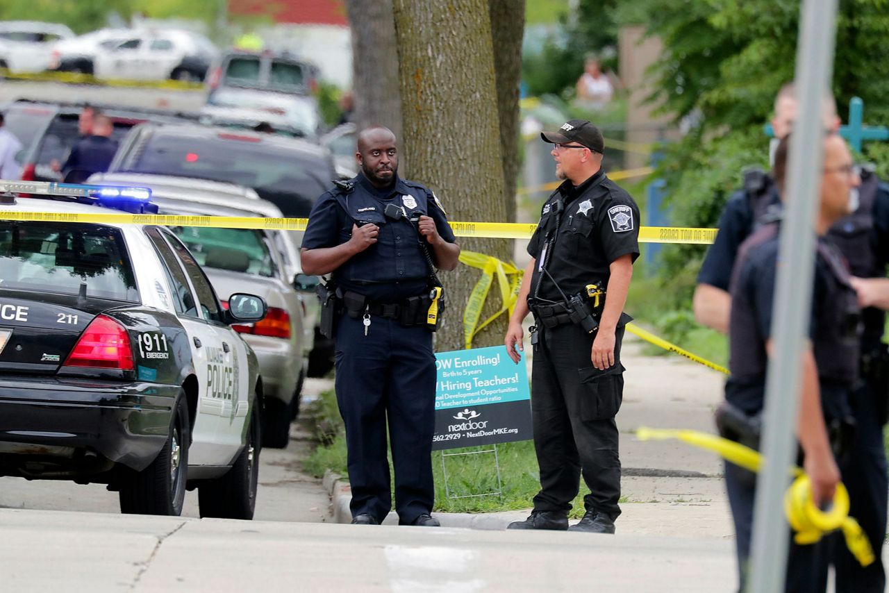 Milwaukee police officer fatally shot; suspect is in custody