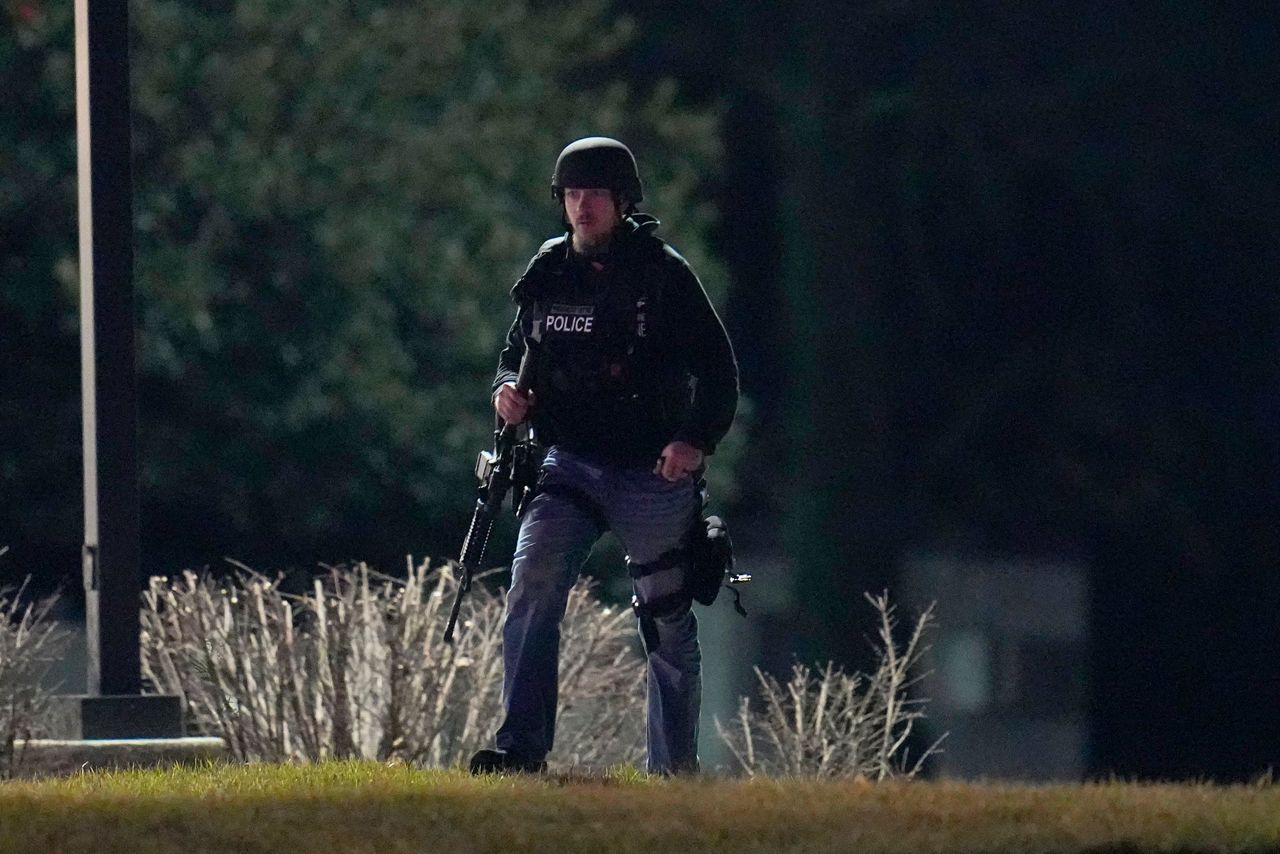 Gunman’s capture ends 39-hour manhunt with 2 officers shot