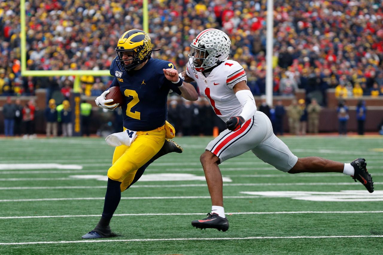 No. 2 Ohio State beats No. 10 Michigan 56-27 for record run