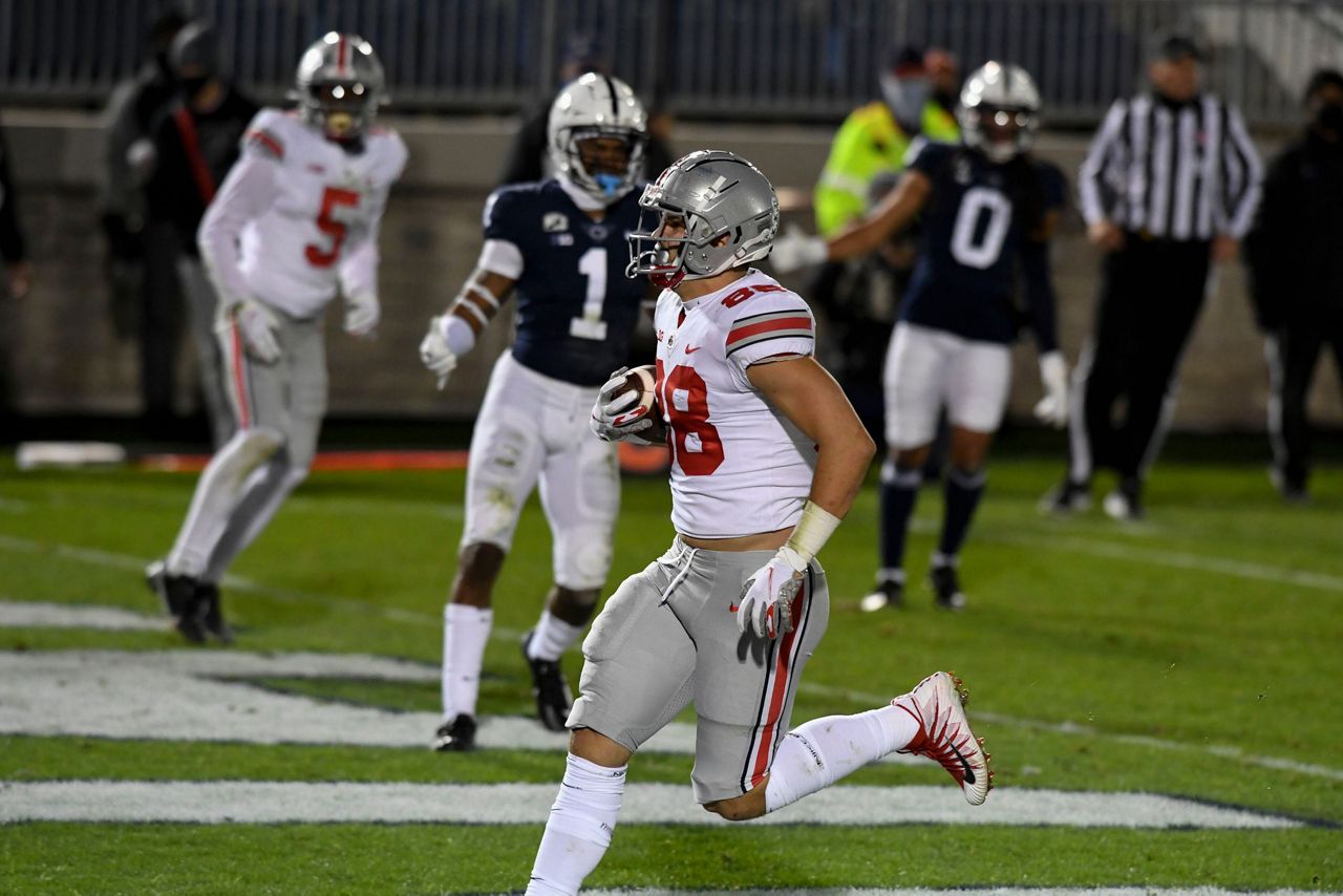 In empty white out, No. 3 Ohio State beats Penn State 38-25