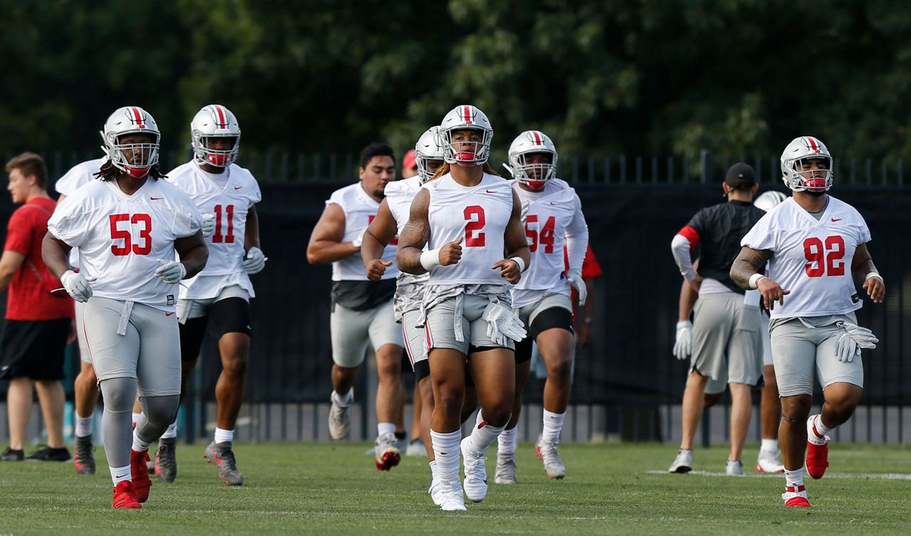 Ohio State training camp opens with new coach, new QB