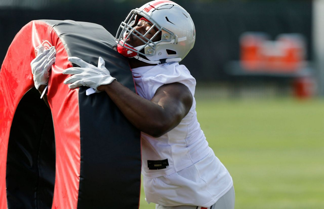 Ohio State training camp opens with new coach, new QB