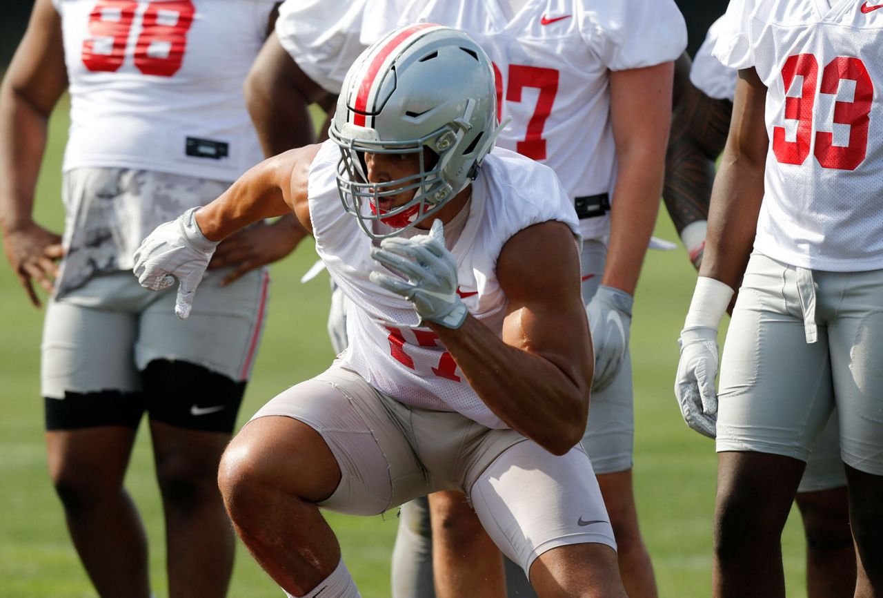 Ohio State training camp opens with new coach, new QB