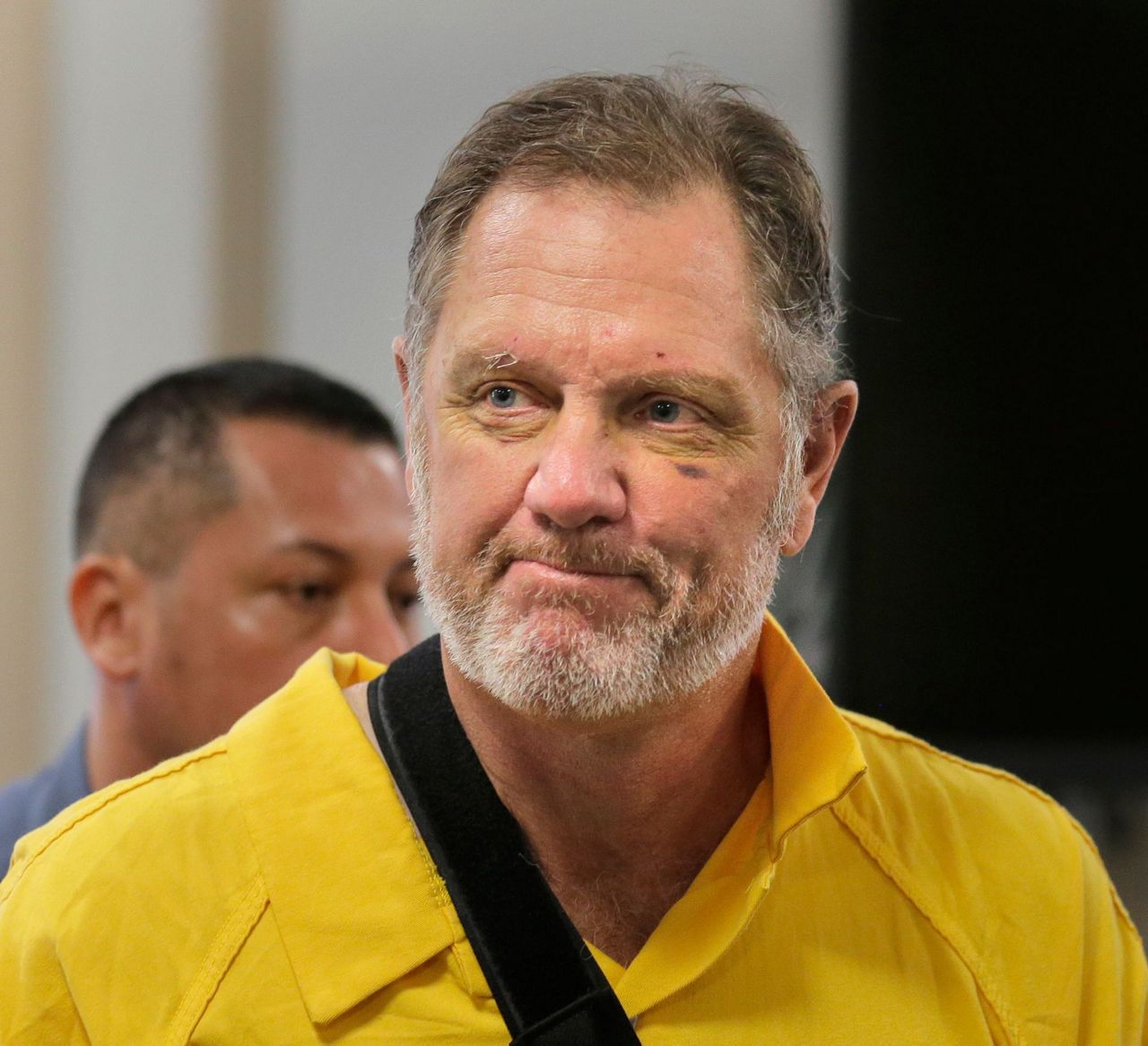 Judge detains former Olympian charged in shooting at farm