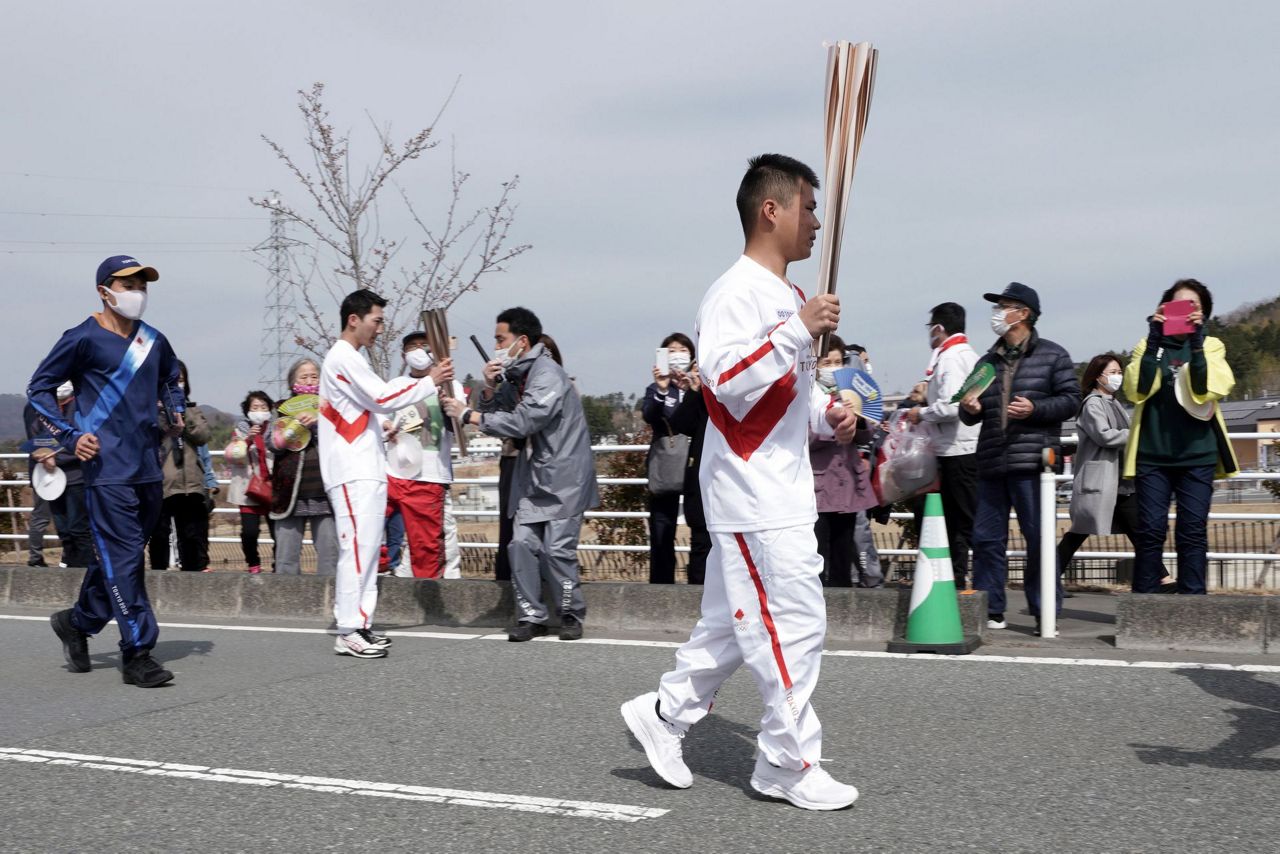 Torch relay for Tokyo Olympics kicks off its 121-day journey