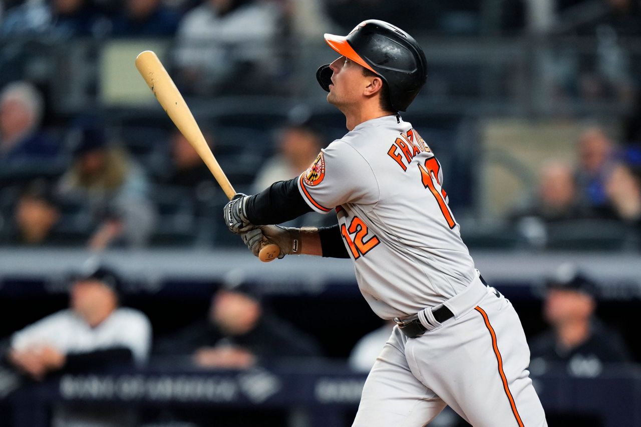 Frazier, Henderson power 8-run 7th, Orioles win 9-6, stop Yanks' 5-game ...
