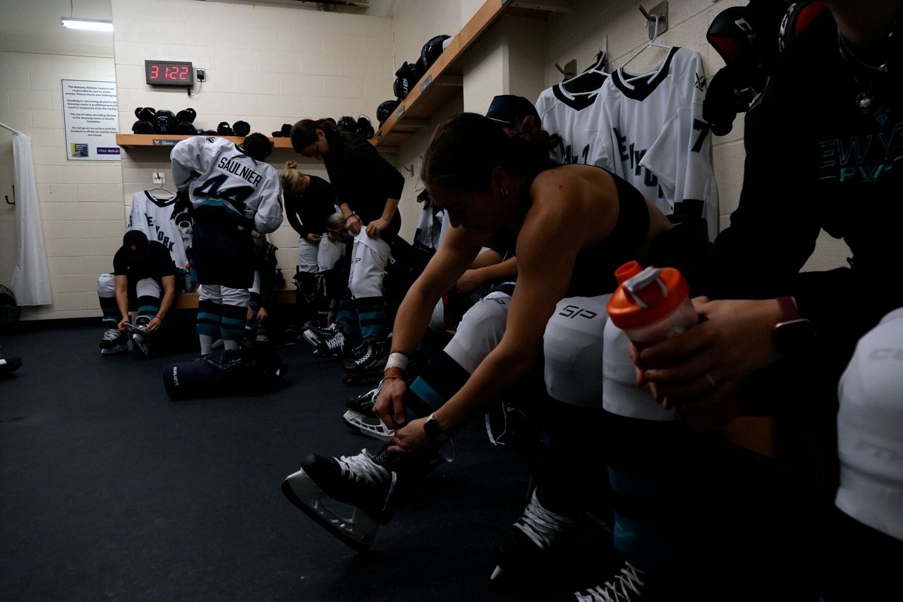 The AP goes behind the scenes at PWHL opener to capture 'the birth of ...