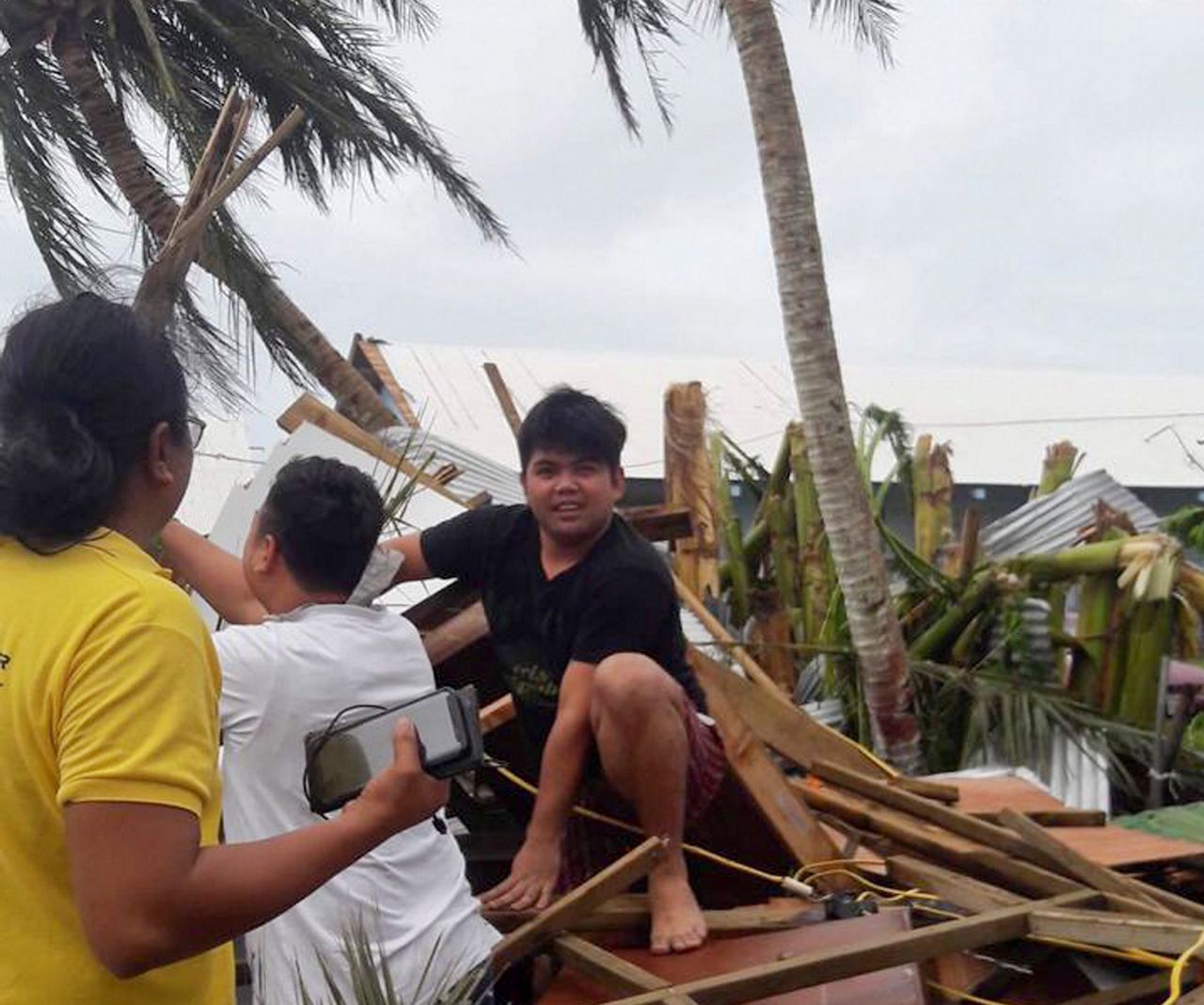 Resilient islanders brace for long recovery after typhoon