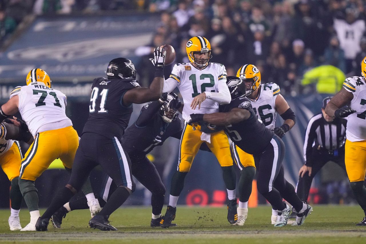 Rodgers says he plans to play Sunday when Packers face Bears