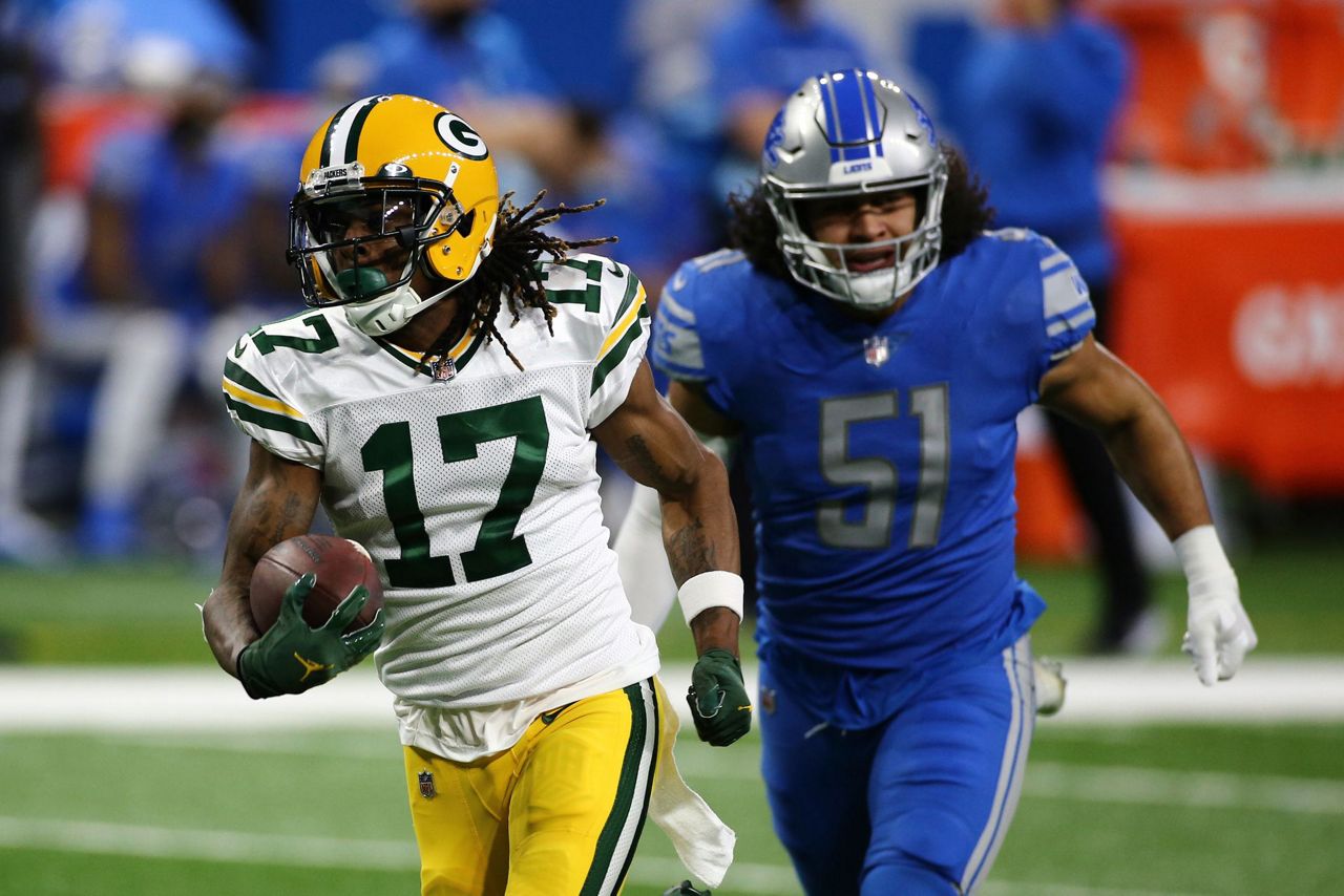 Rodgers-led Packers beat Lions 31-24, clinch NFC North title