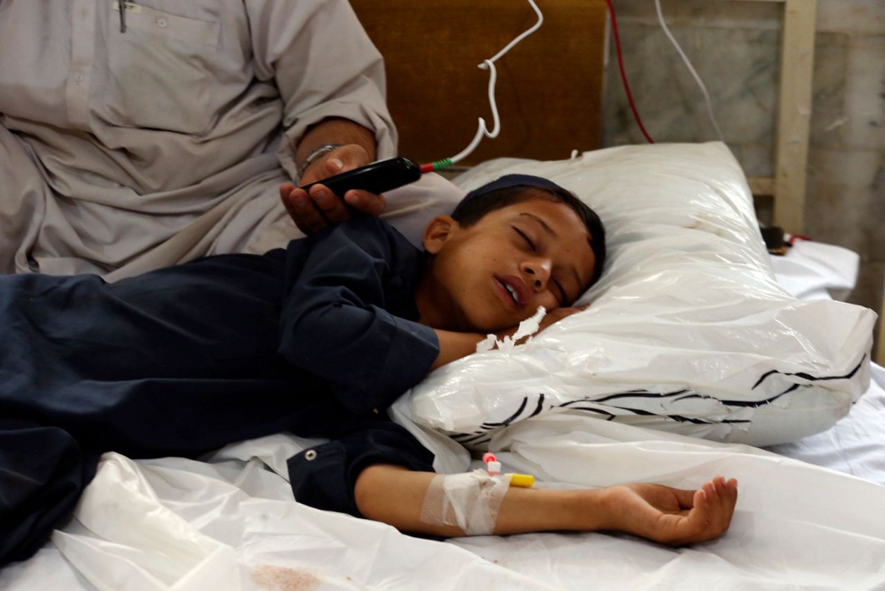 A bomb at a political rally in northwest Pakistan kills at least 35 ...