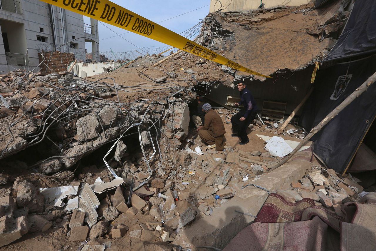 Militant who killed 101 at Pakistan mosque wore uniform